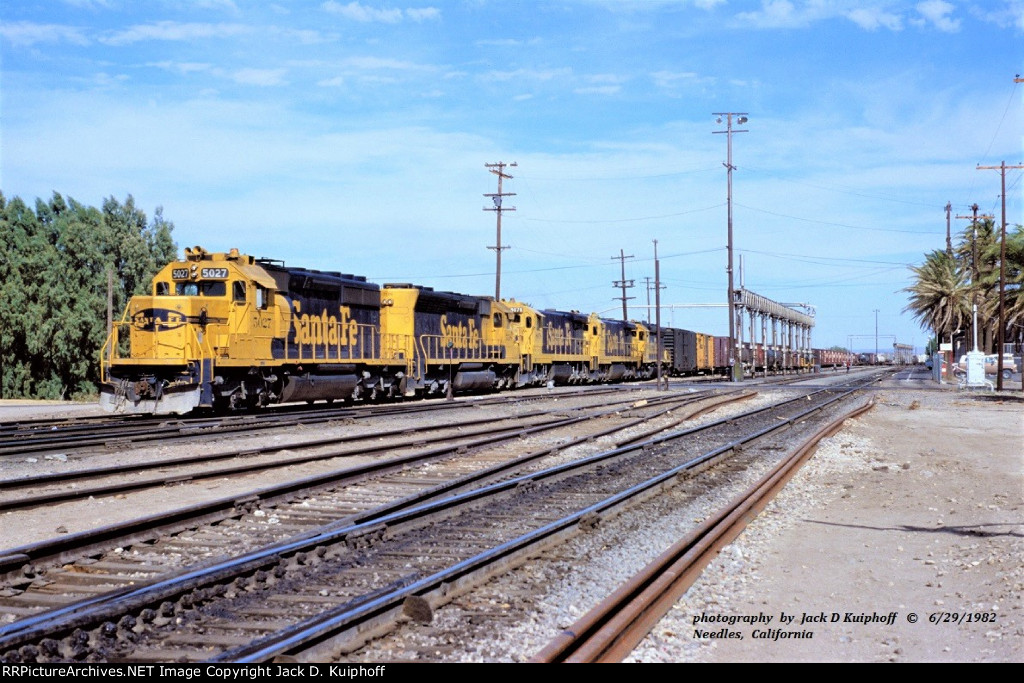 AT&SF SD40-2 5027, leads a westbound out of Needles, California. June 29, 1982